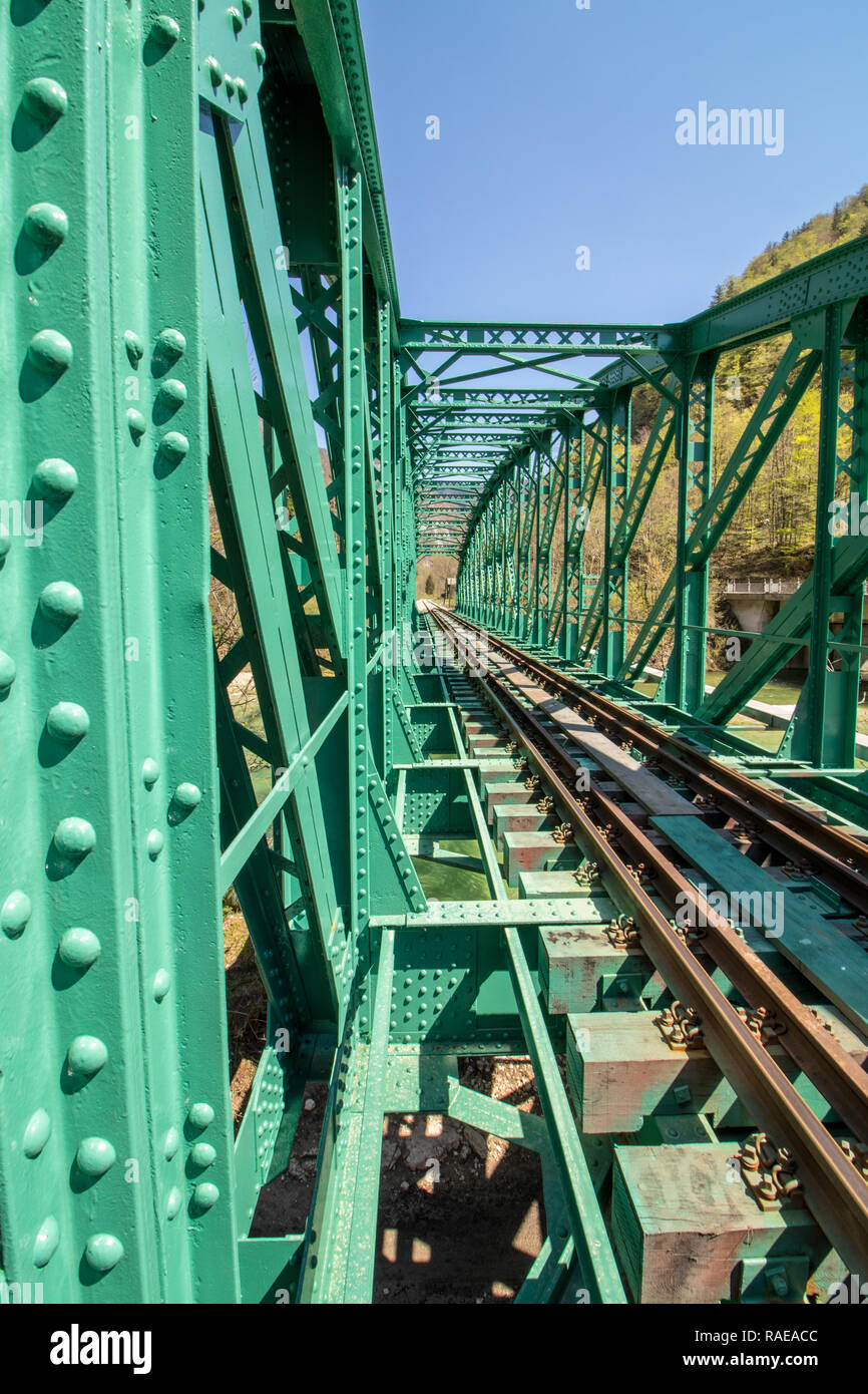 green color train bridge left side Stock Photo - Alamy