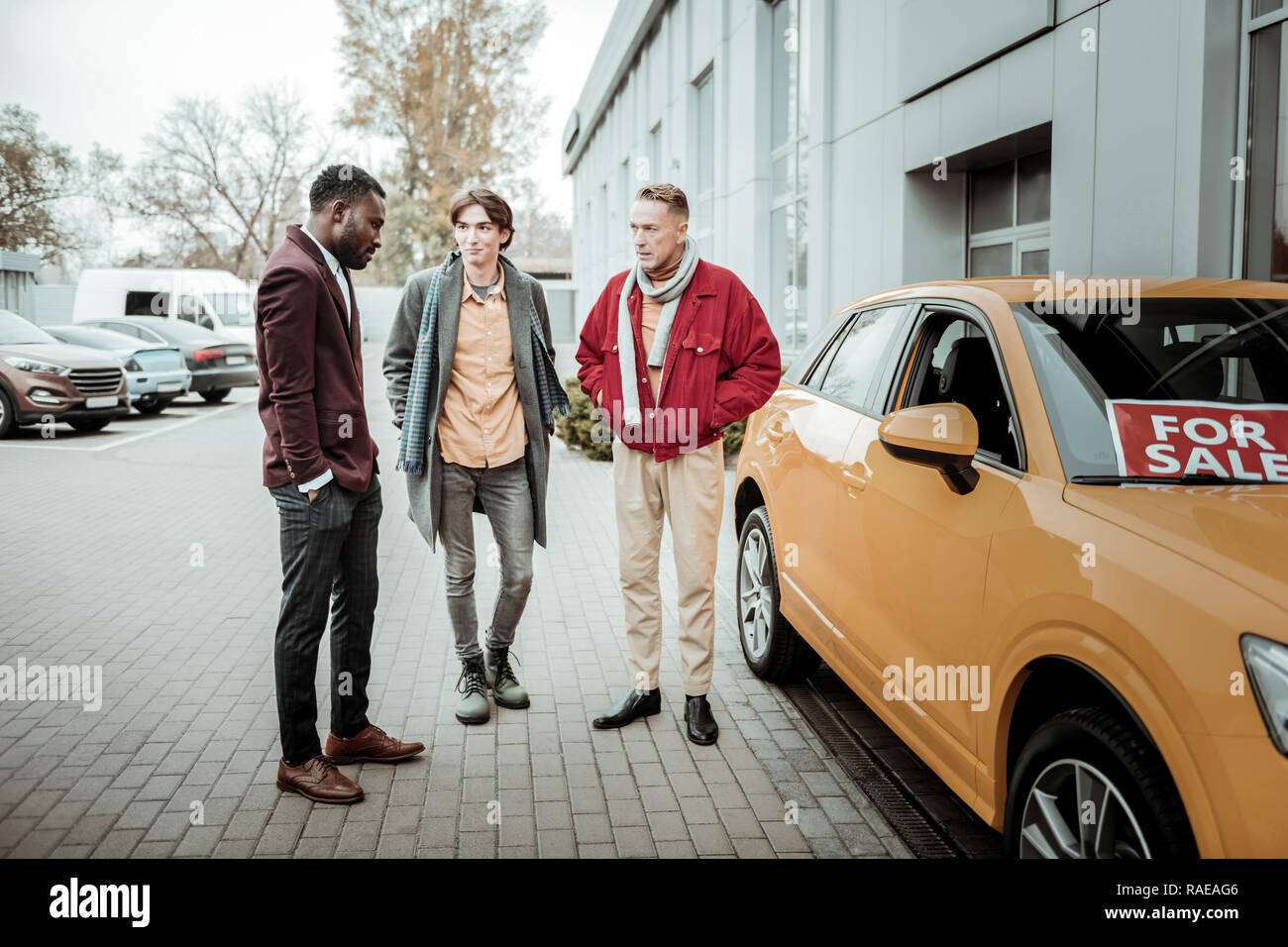 Man wearing beige jacket hi-res stock photography and images - Alamy