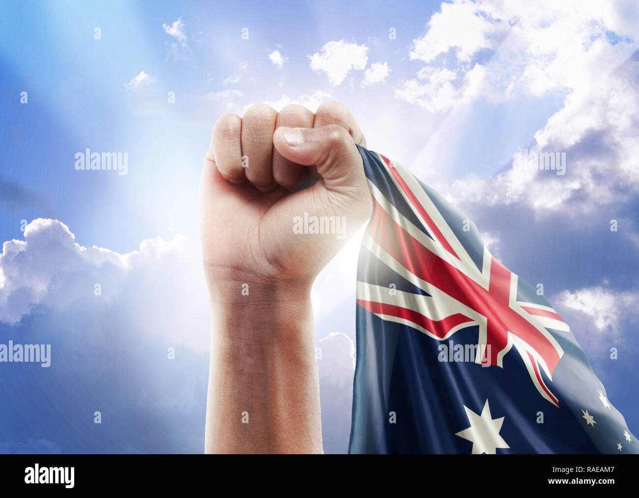National flag of Australia painted in the hands of people with closed ...