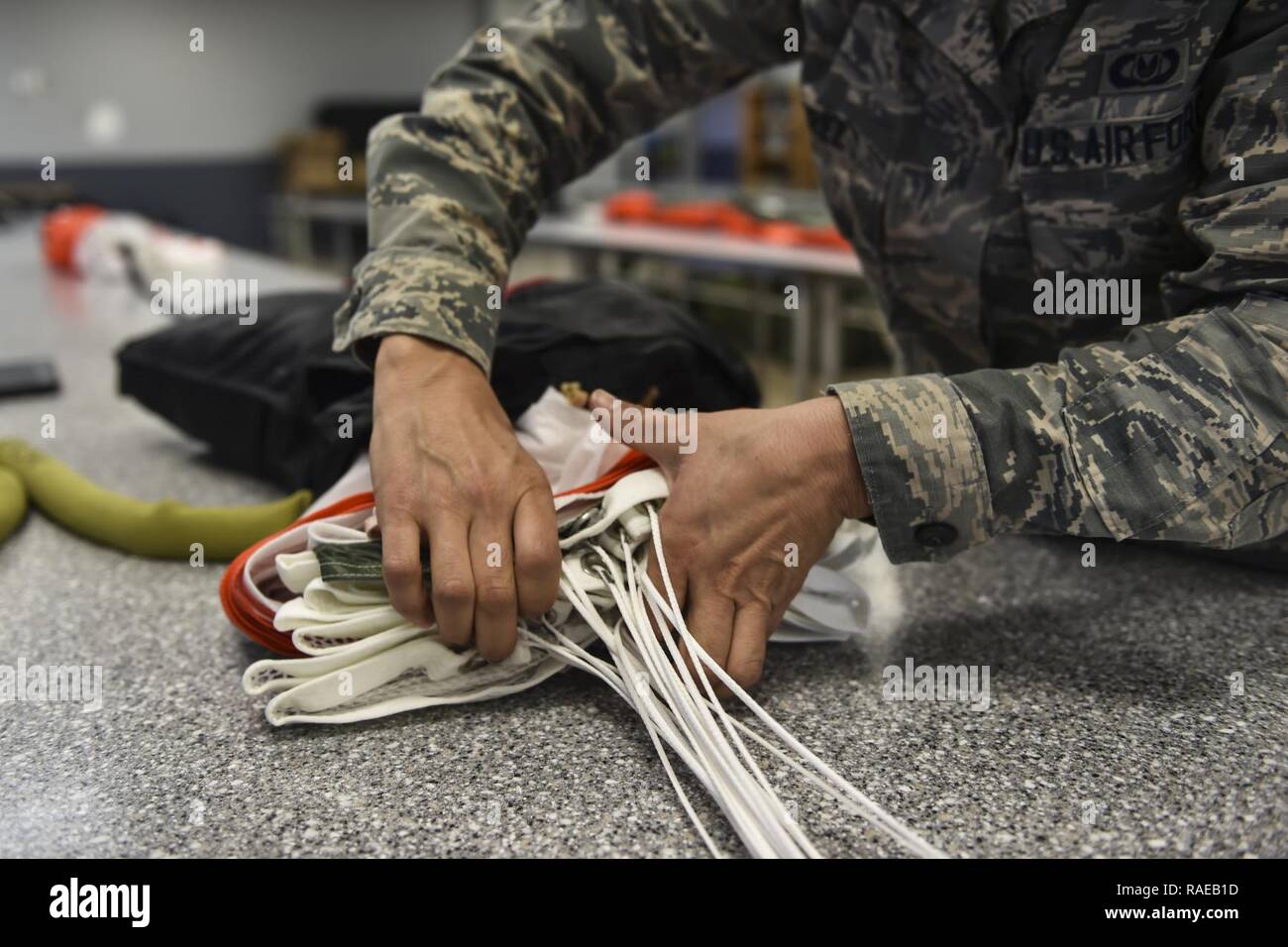 Airman 1st Class Maria Perez, an aircrew flight equipment specialist ...