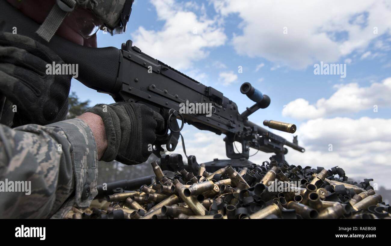 An 11th Security Forces Squadron members shoots a M240B machine guns during heavy weapons ...