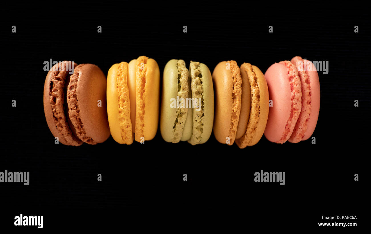 French macaroons or macarons, selection of different colors and flavors ...