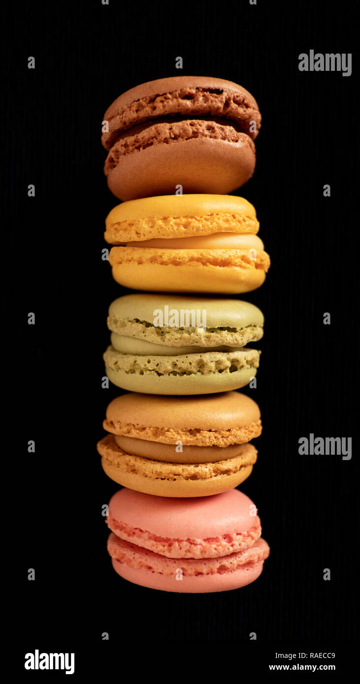French macaroons or macarons, selection of different colors and flavors ...