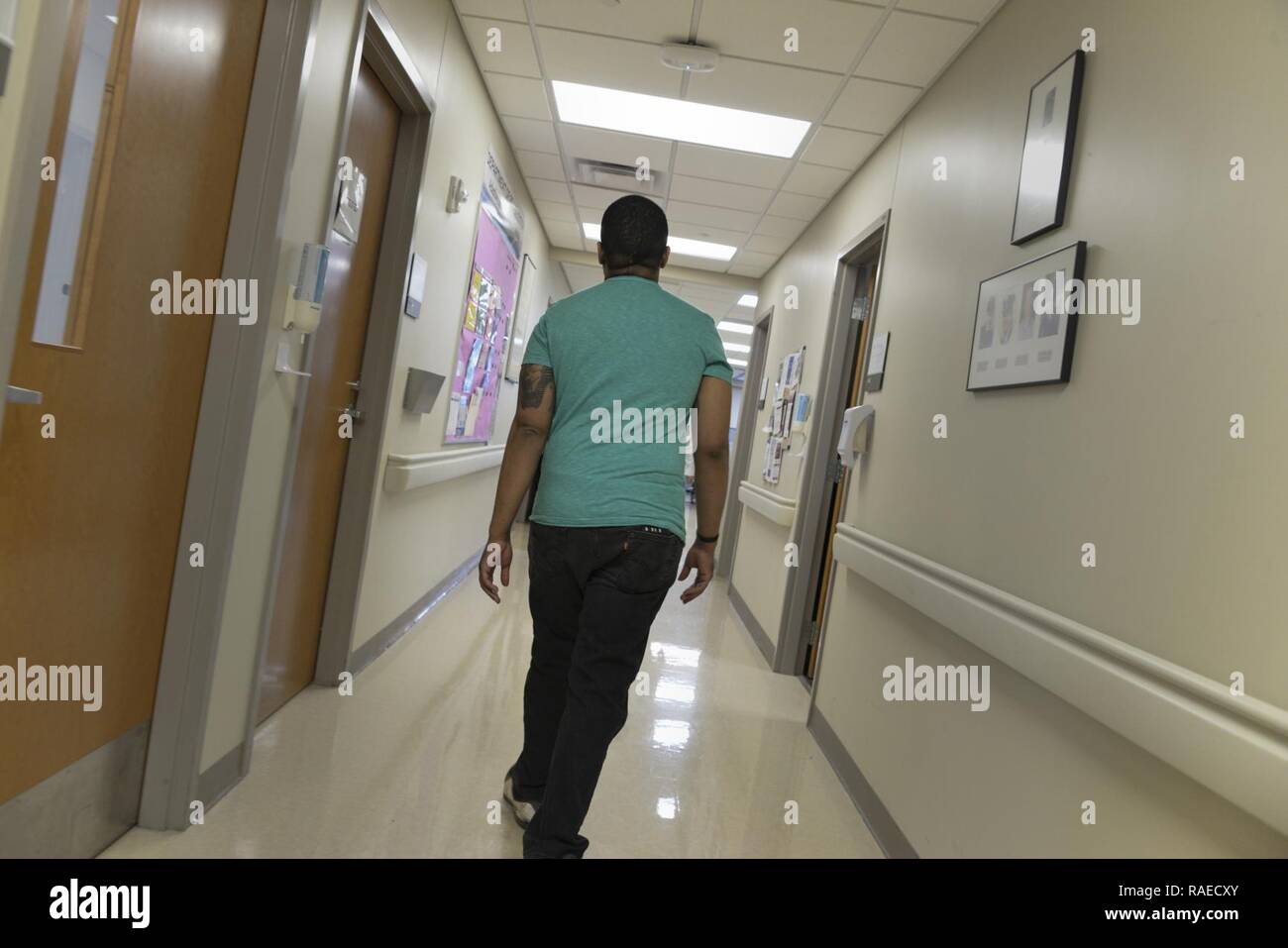 Staff Sgt. Rasheed, 7th Intelligence Squadron, walks the hallways of ...