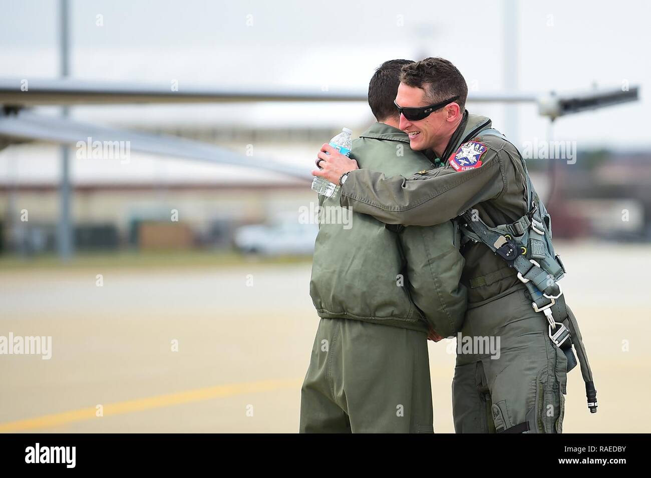 From left, U.S. Air Force Maj. Daniel Dickinson, F-22 Raptor ...