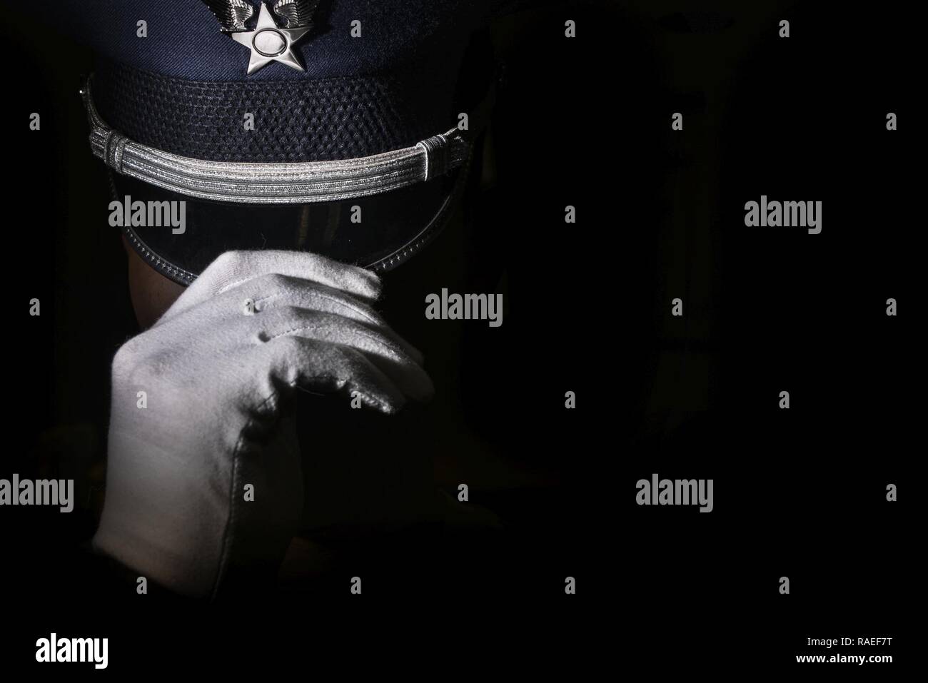 Senior Airman Jeremy, 94th Intelligence Squadron, adjust his ceremonial ...