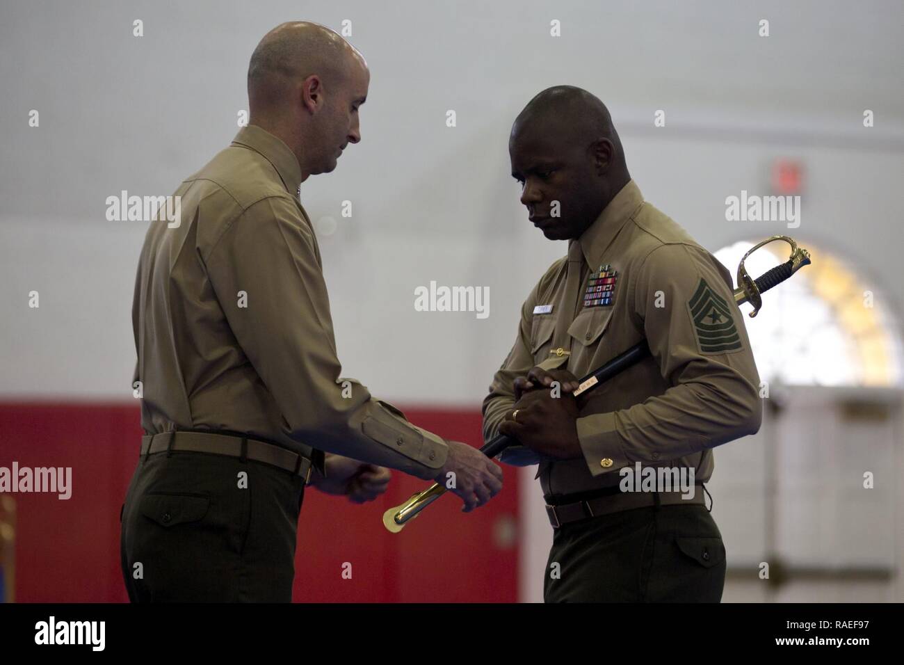U.S. Marine Corps Lt. Col. Jared C. Voneida, left, commanding officer ...