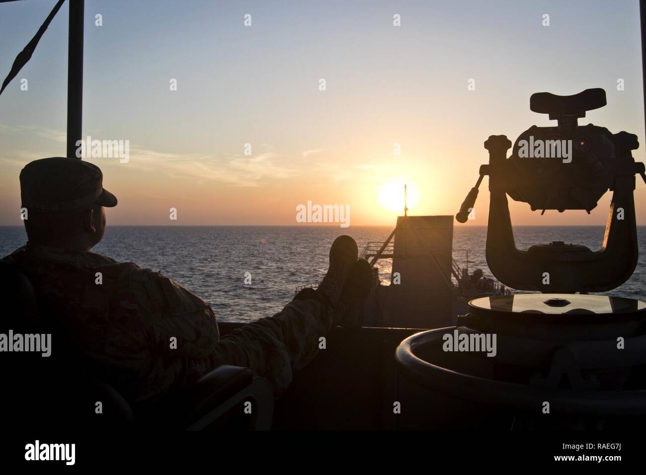 A U.S. Army Reserve Soldier scans the horizon while aboard the ...