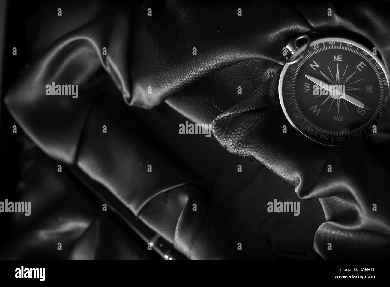 Compass pointing south Black and White Stock Photos & Images - Alamy