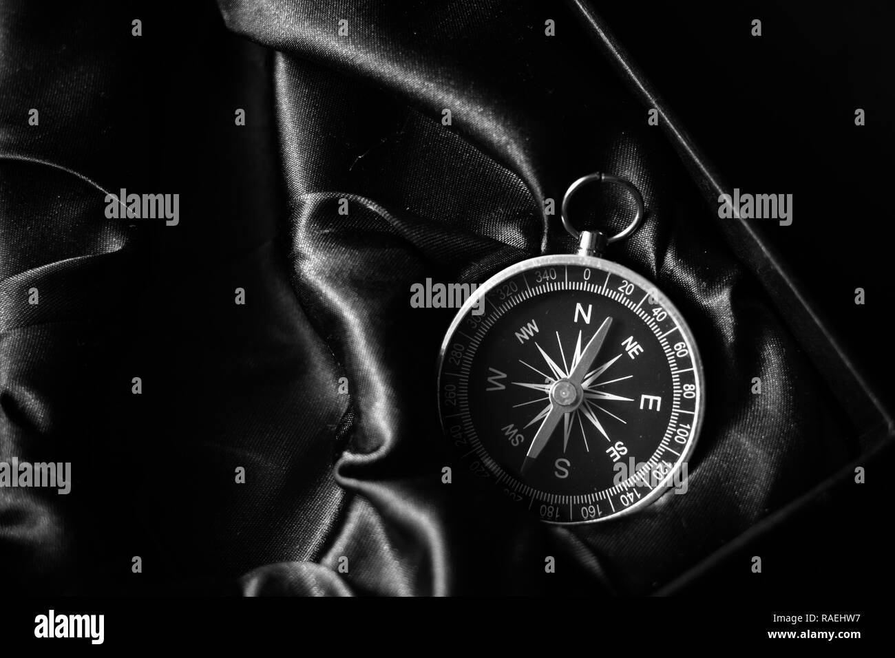 Navigation compass pointing north Black and White Stock Photos & Images ...