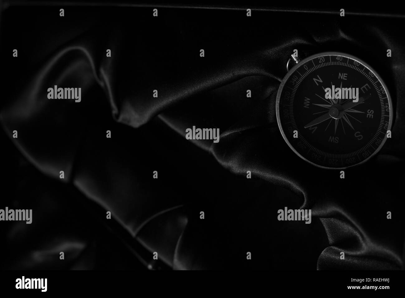 Compass pointing south Black and White Stock Photos & Images - Alamy