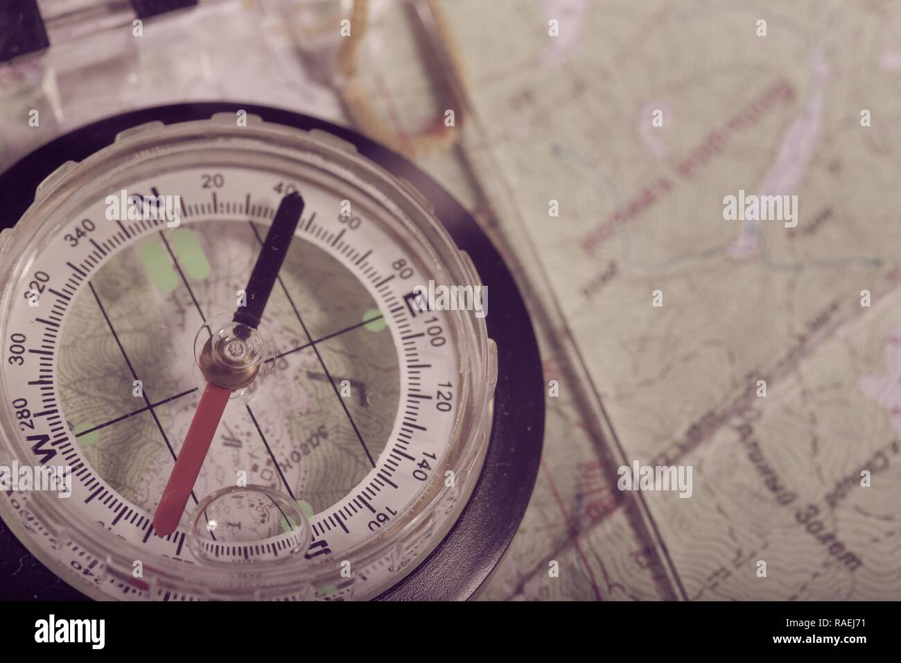 retro style abstract shoot with the compass on a map Stock Photo - Alamy