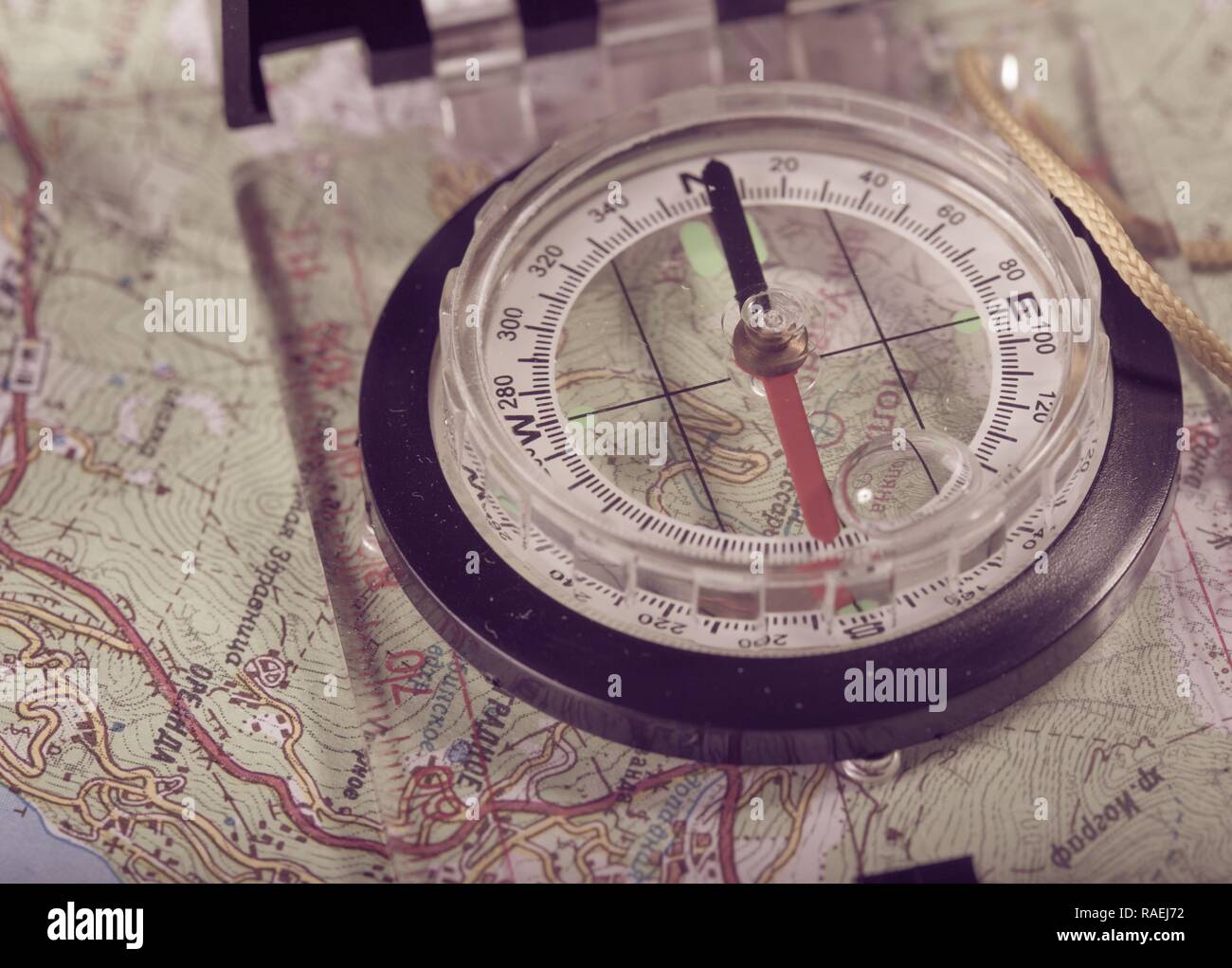 retro style abstract shoot with the compass on a map Stock Photo - Alamy