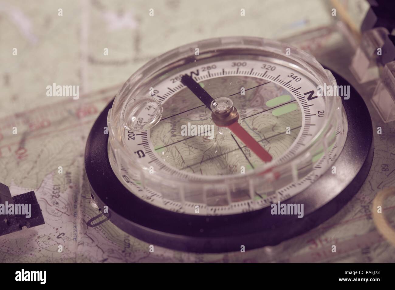 retro style abstract shoot with the compass on a map Stock Photo - Alamy