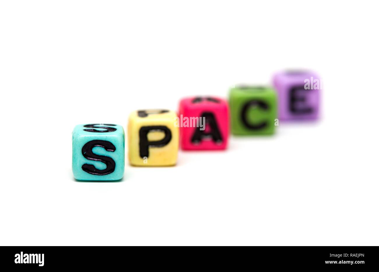 space - word made from multicolored child toy cubes with letters Stock ...
