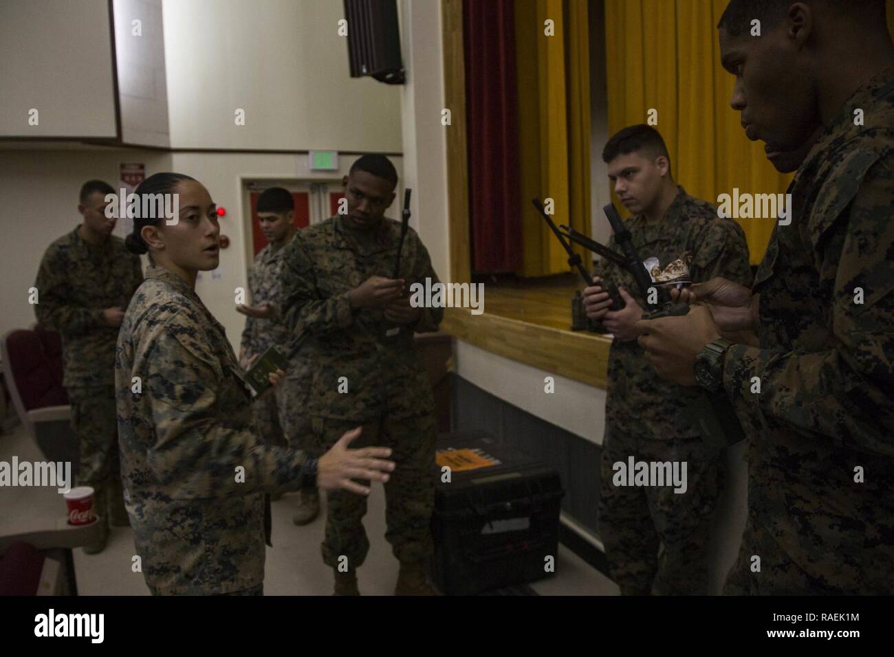 U.S. Marine Corps Cpl. Alexis Gonzalez, teaches Marines how to properly ...