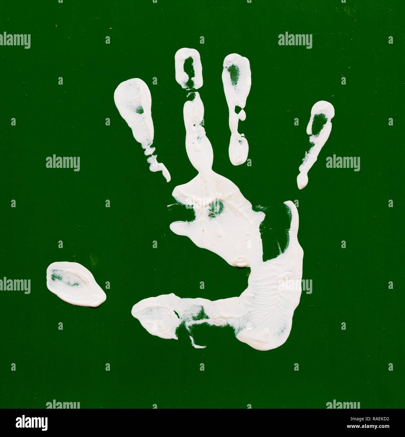 white paints children fingerprints on a multicolored background Stock ...