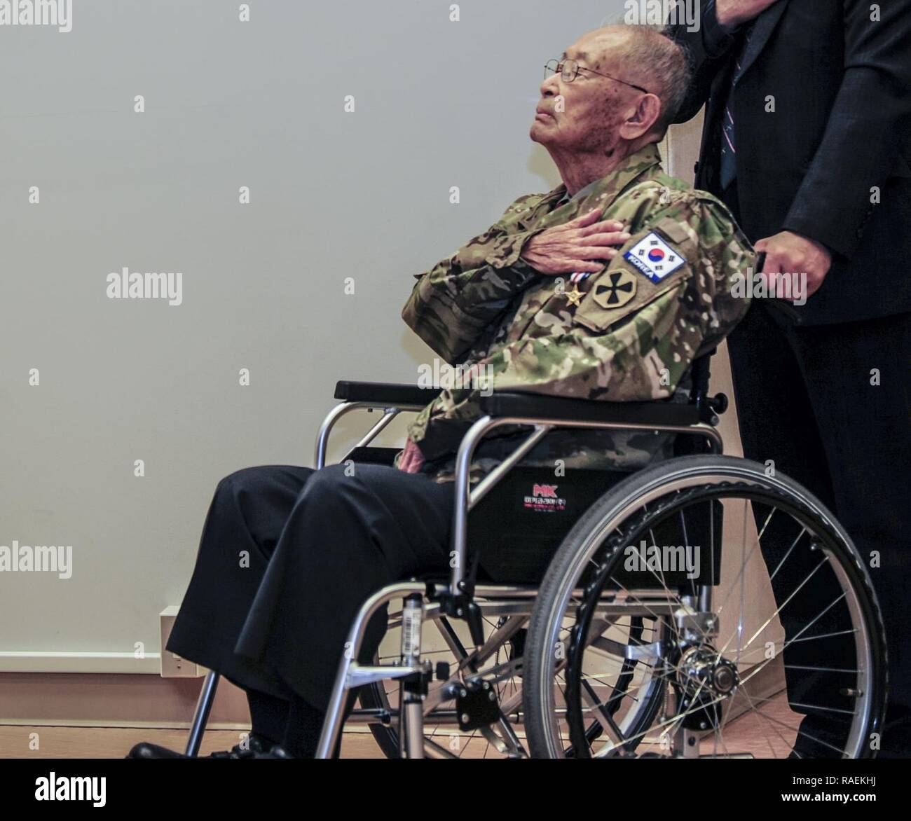 Republic of Korea (ROK) Army Ret. Gen. Paik Sun-Yup holds his hand over ...