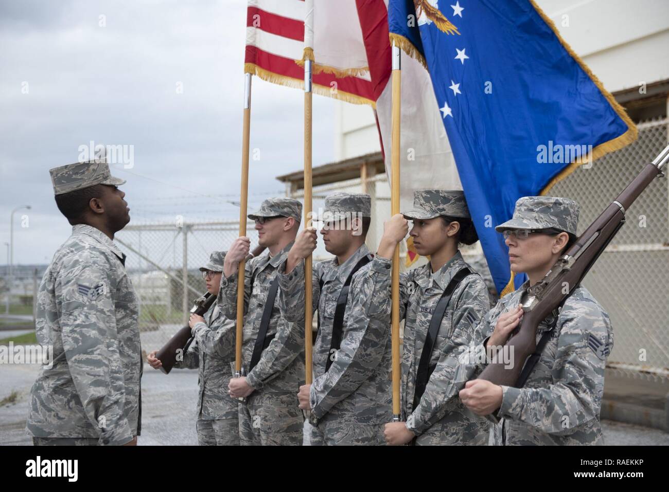 U.S. Air Force Airmen with the 18th Wing Base Honor Guard practice ...