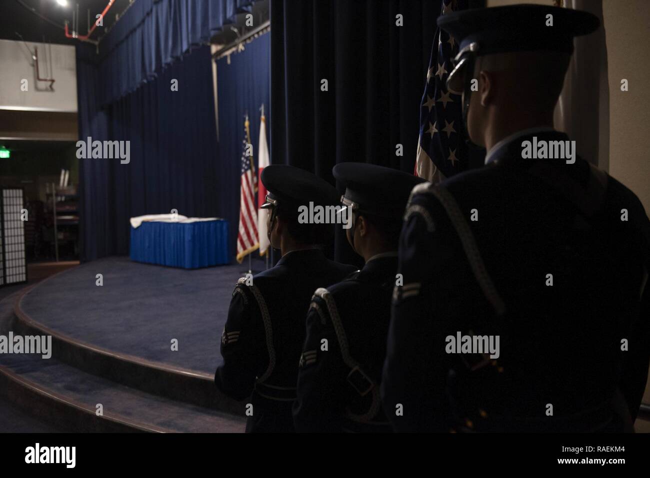 U.S. Air Force Airmen with the 18th Wing Base Honor Guard wait at ...