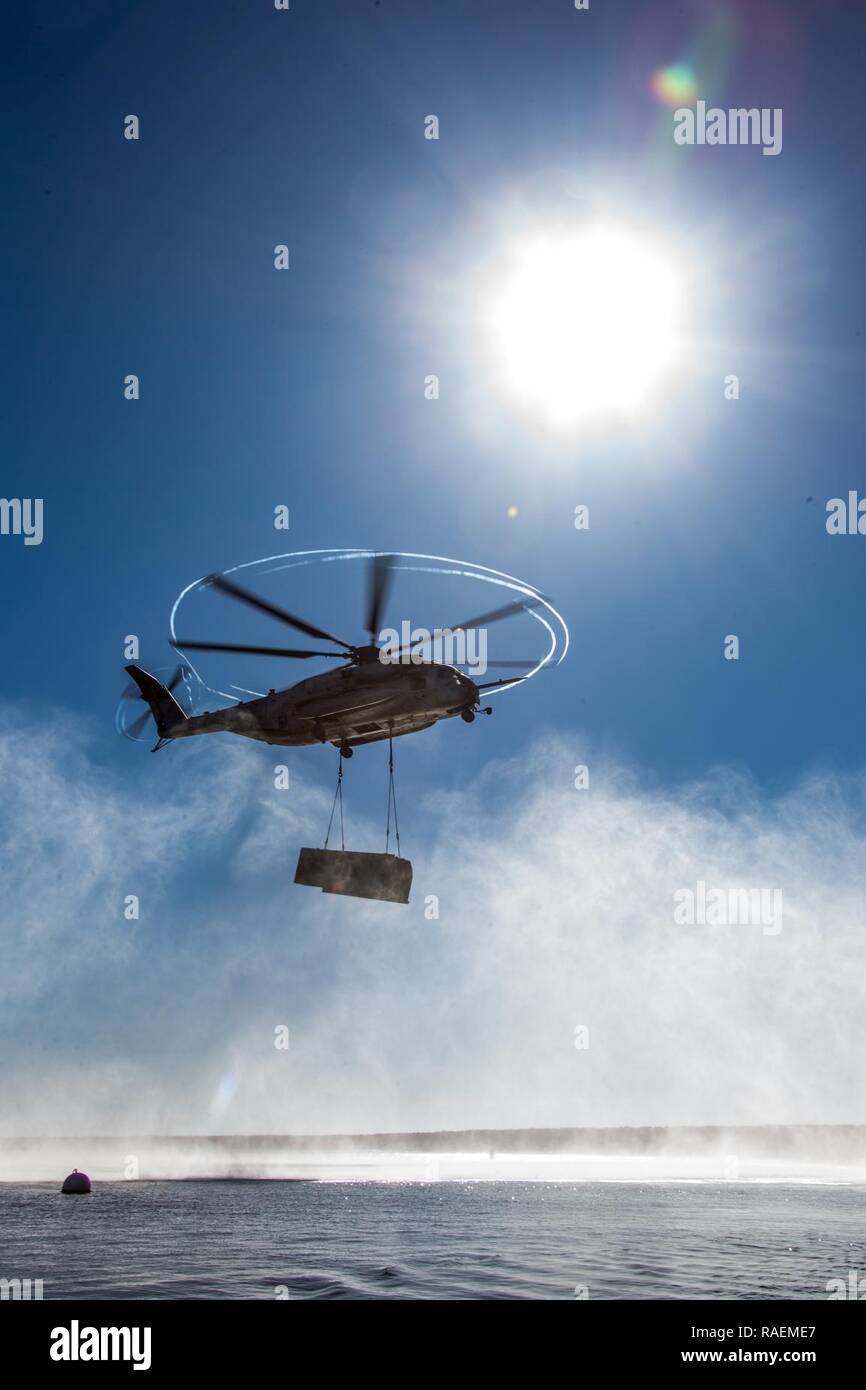 A U.S. Marine Corps CH-53E Super Stallion drops an improved ribbon ...