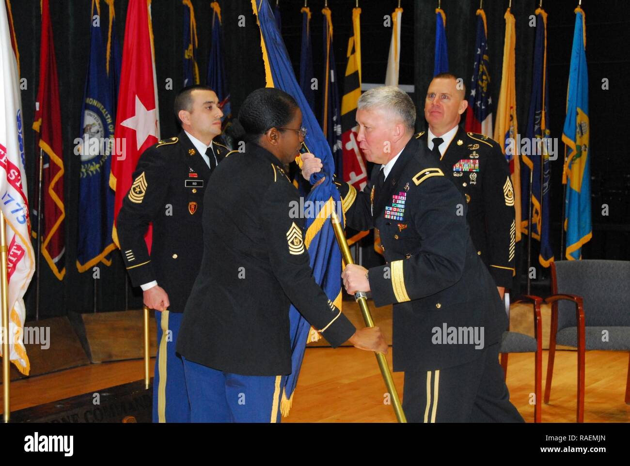 Command Sgt. Maj. Henney Hodgkins accepts the colors of the 20th Chemical, Biological ...