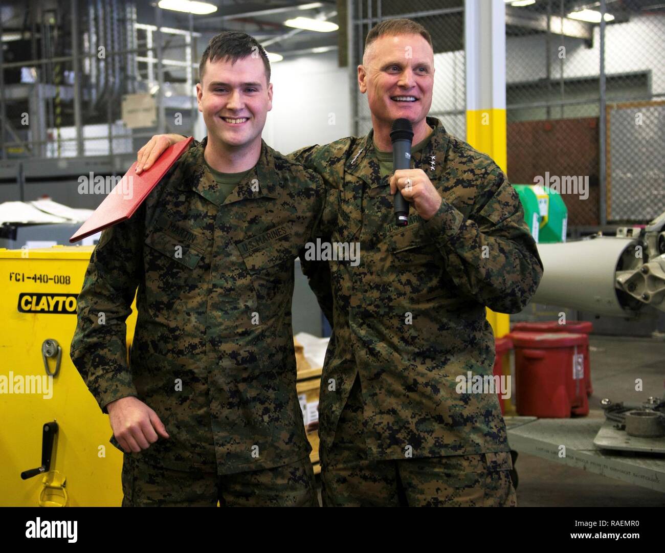 U.S. Marine Corps Lt. Gen. Stephen Rudder speaks after awarding Cpl ...