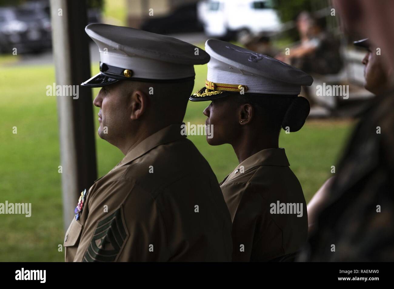 U.S. Marine Corps Lt. Col. Marshalee Clarke, right, commanding officer, Headquarters Battalion ...