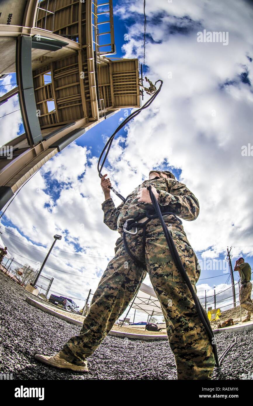 A Marine with the 11th Marine Expeditionary Unit belays during a ...