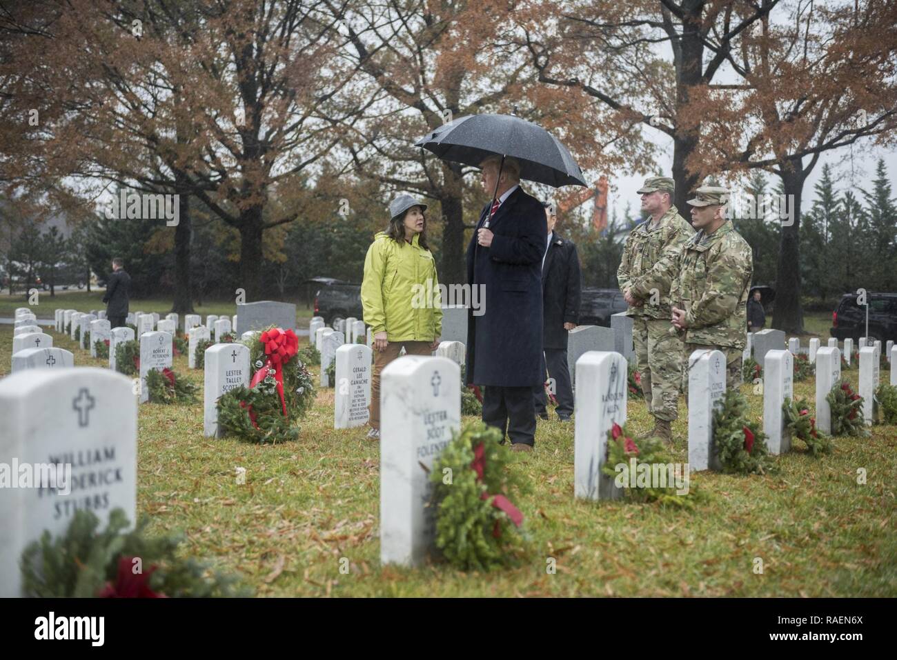 President Donald J. Trump (center) visits with Karen Durham-Aguilera ...