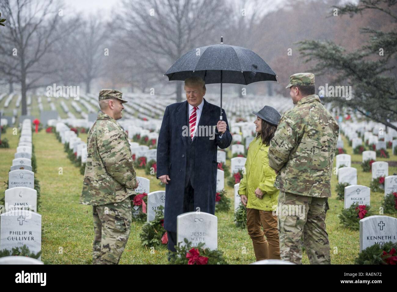 President Donald J. Trump (center) visits with Karen Durham-Aguilera ...