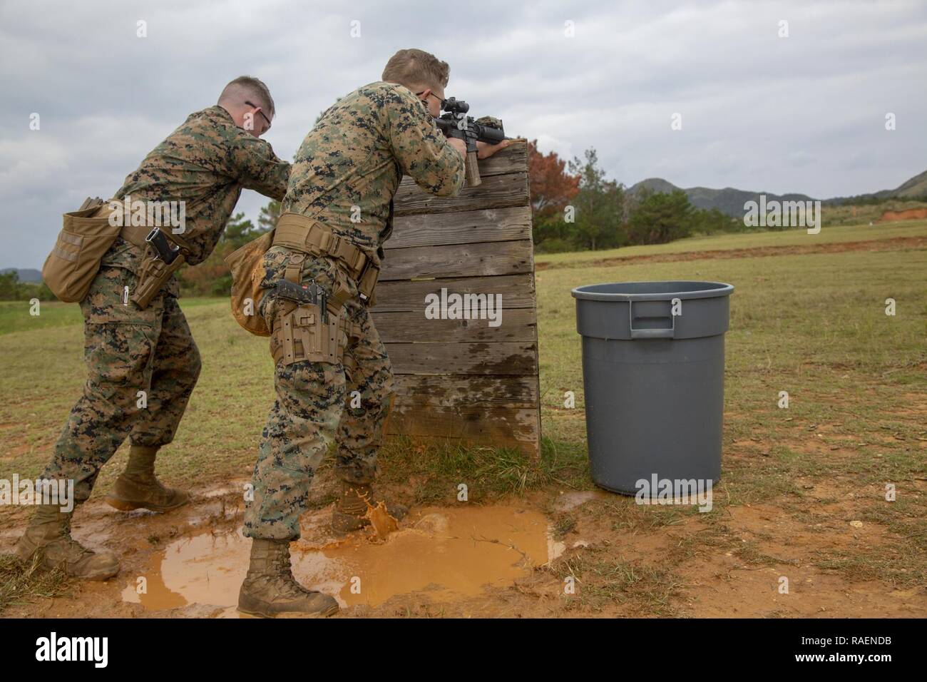 U.S. Marines competing in the Far East Marksmanship Competition engage ...