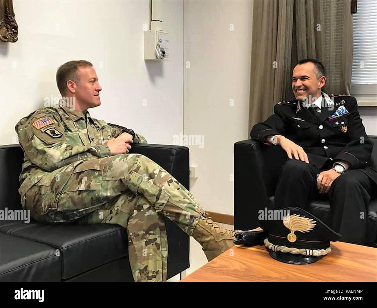 U.S. Army Garrison Italy Commander Col. Erik M. Berdy (left) welcomes ...