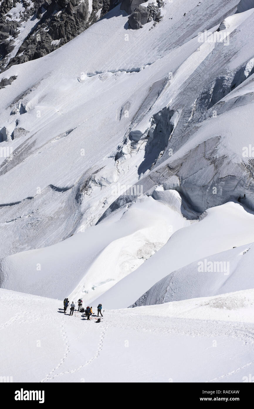 Mountaineers ascending to Mont Blanc in Chamonix, France. Vertical image Stock Photo - Alamy