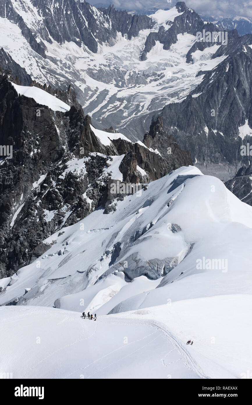 Mountaineers ascending to Mont Blanc in Chamonix, France. Vertical image Stock Photo - Alamy