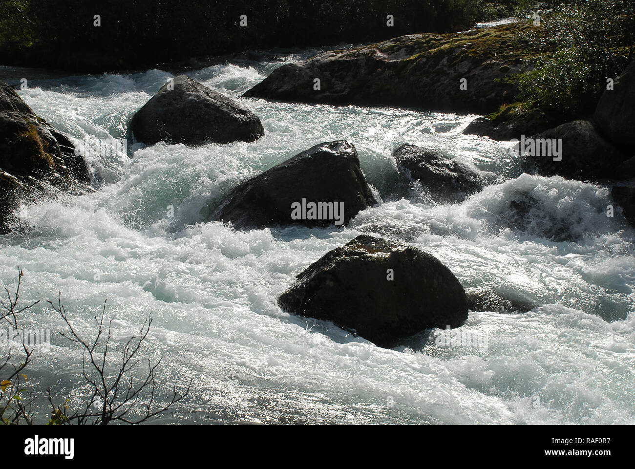 River rapids nearby the Briksdal Glacier (Olden, Norway Stock Photo - Alamy