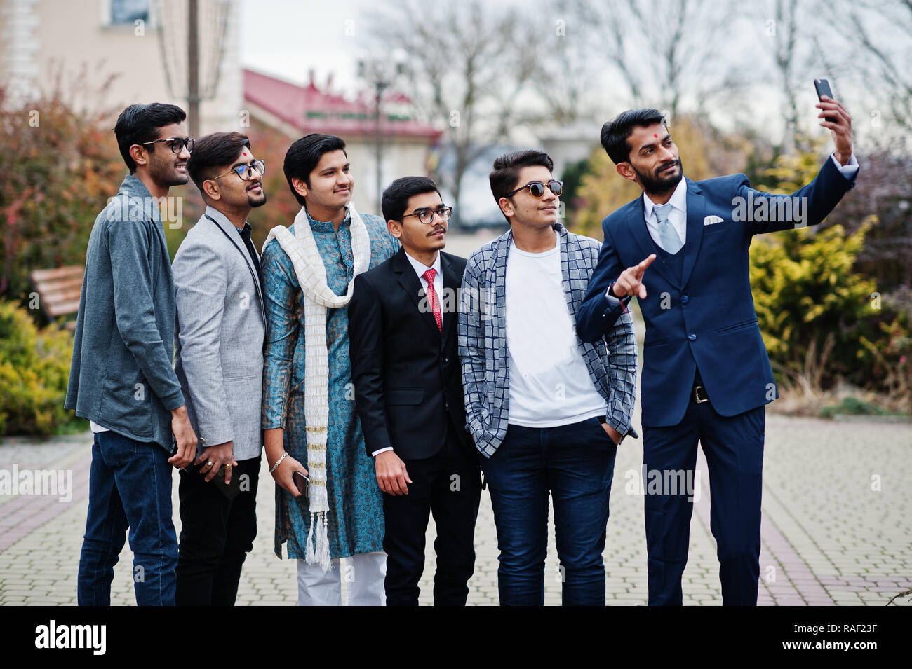 Group of six south asian indian mans in traditional, casual and ...