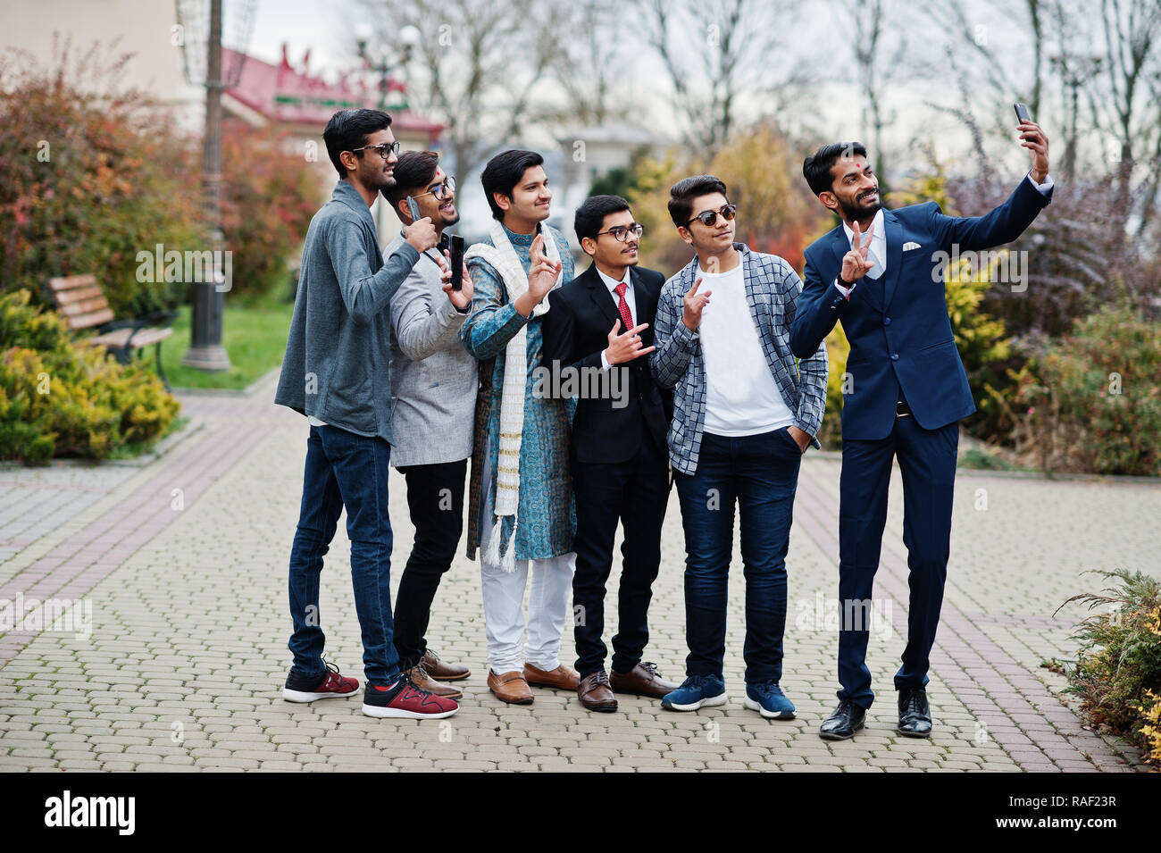 Group of six south asian indian mans in traditional, casual and ...
