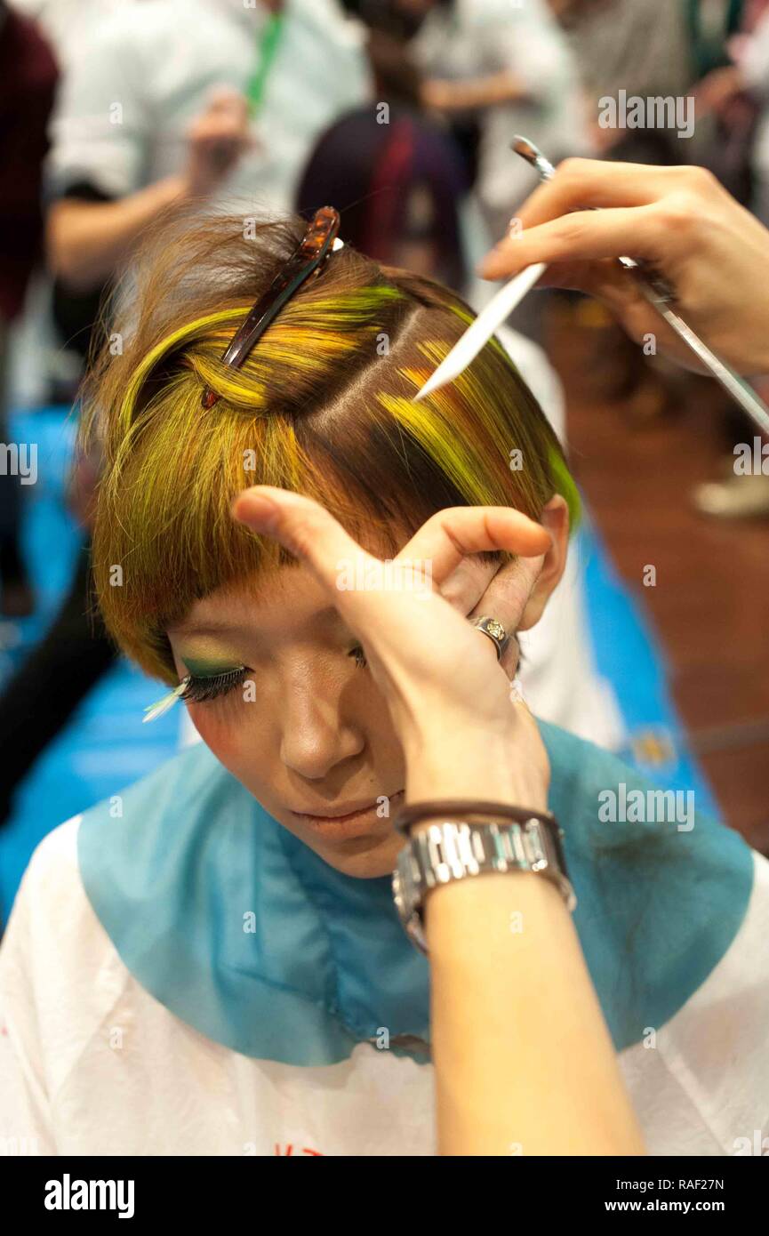 Asian female model poses for pictures at the hair cut Stock Photo - Alamy