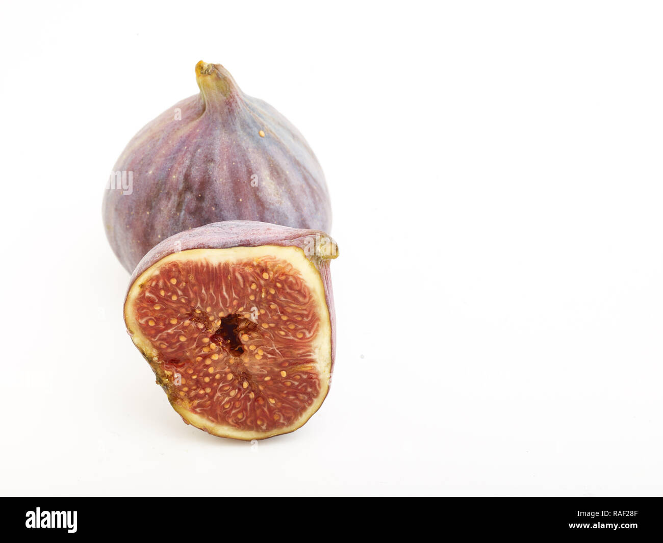 Fig fruit against white background, food still-life photograph Stock ...