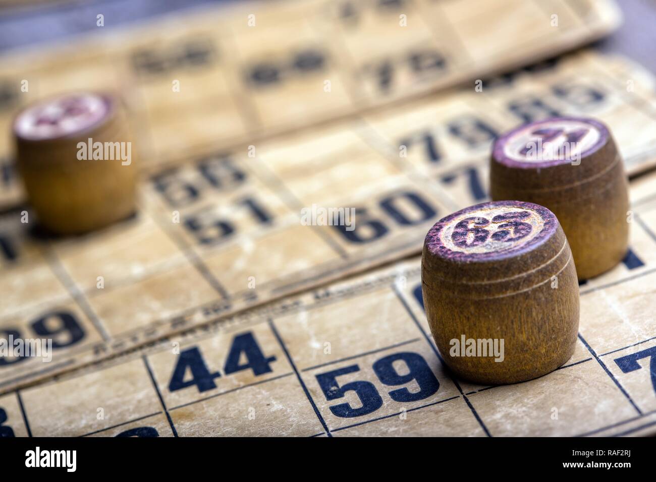 old wooden lotto barrels and game cards Stock Photo - Alamy