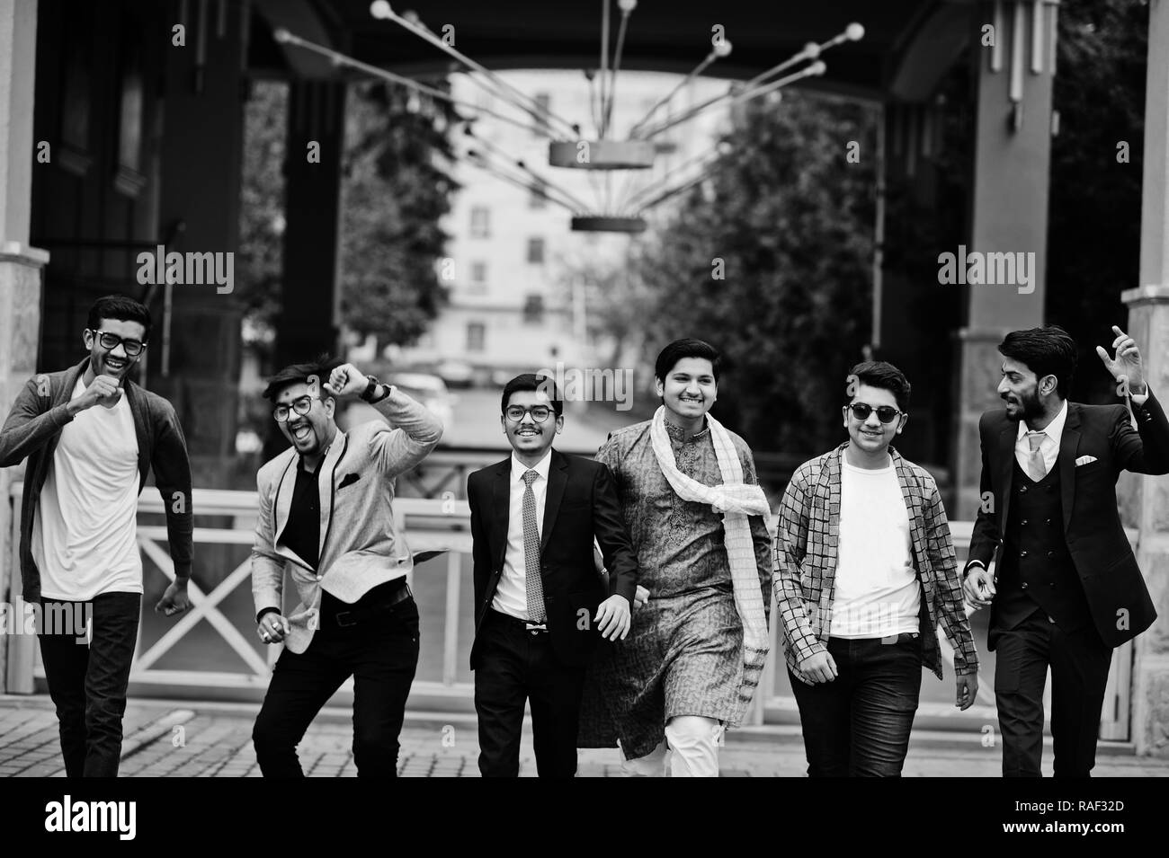 Group of six south asian indian mans in traditional, casual and ...