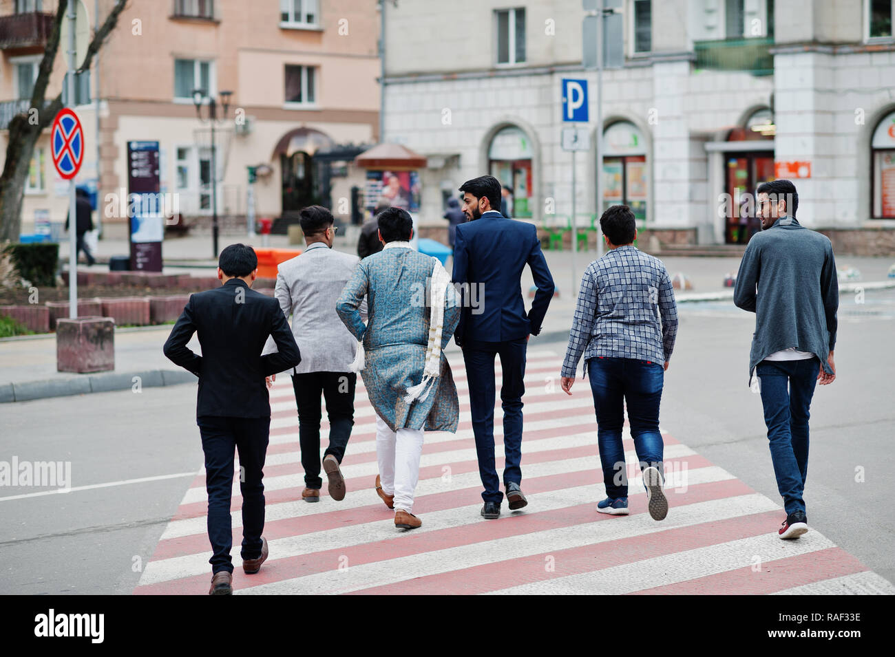 Back of group six south asian indian mans in traditional, casual and ...