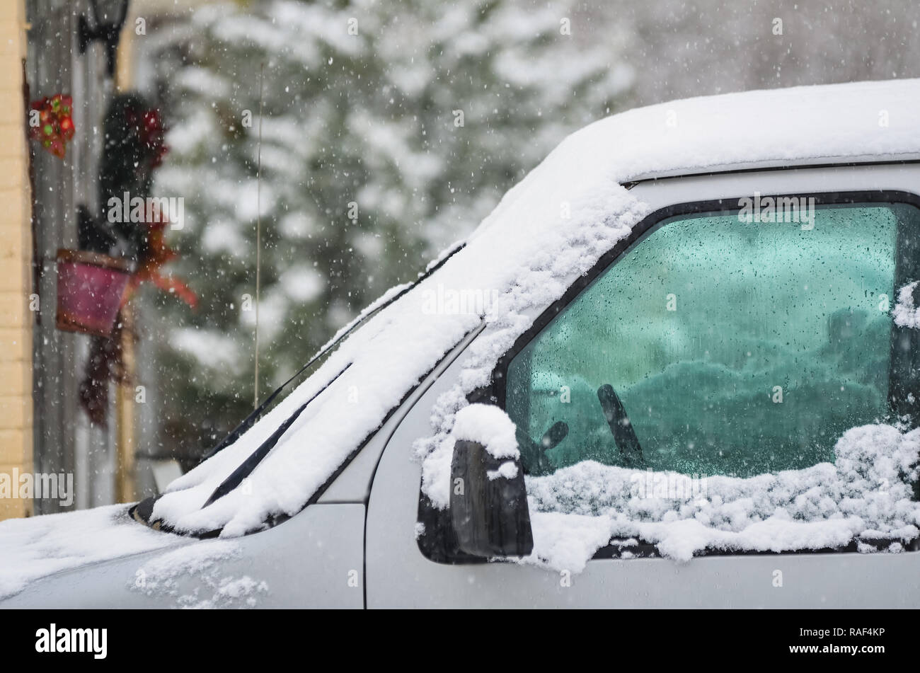 Truck being covered by snow in the winter Stock Photo - Alamy