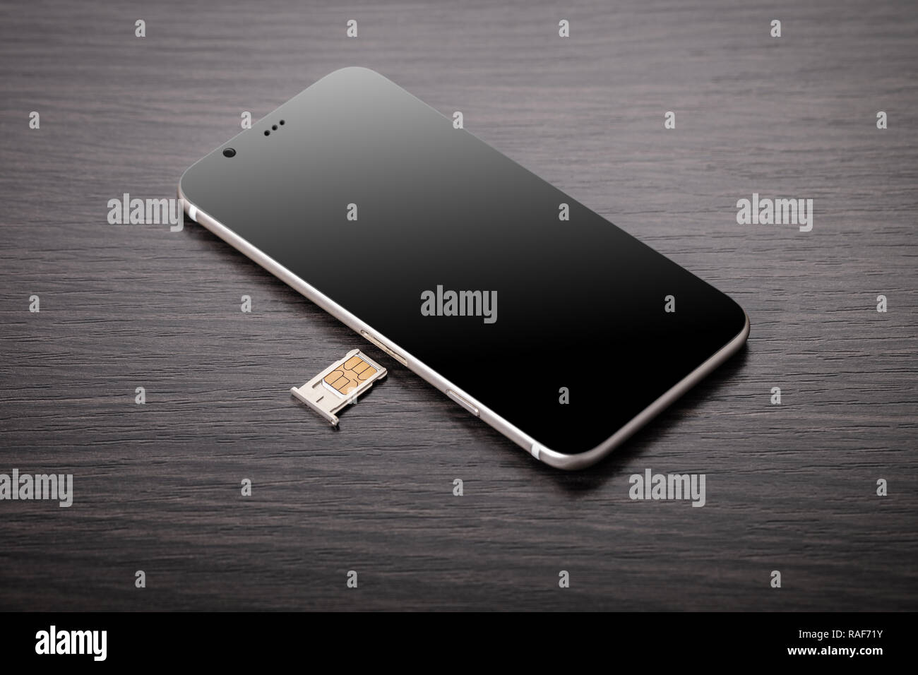 mobile phone and sim card on a wooden background Stock Photo - Alamy