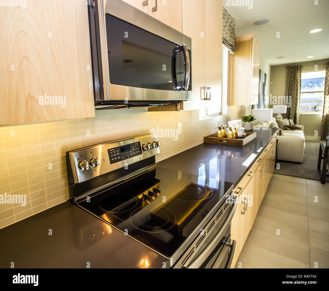 Long Modern Kitchen Granite Counter Stock Photo - Alamy