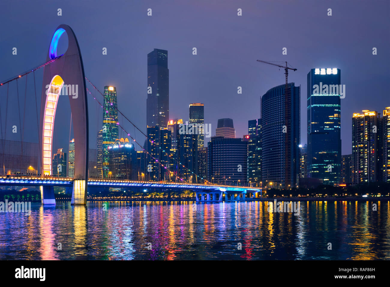 Guangzhou cityscape skyline over the Pearl River with Liede Bridge ...
