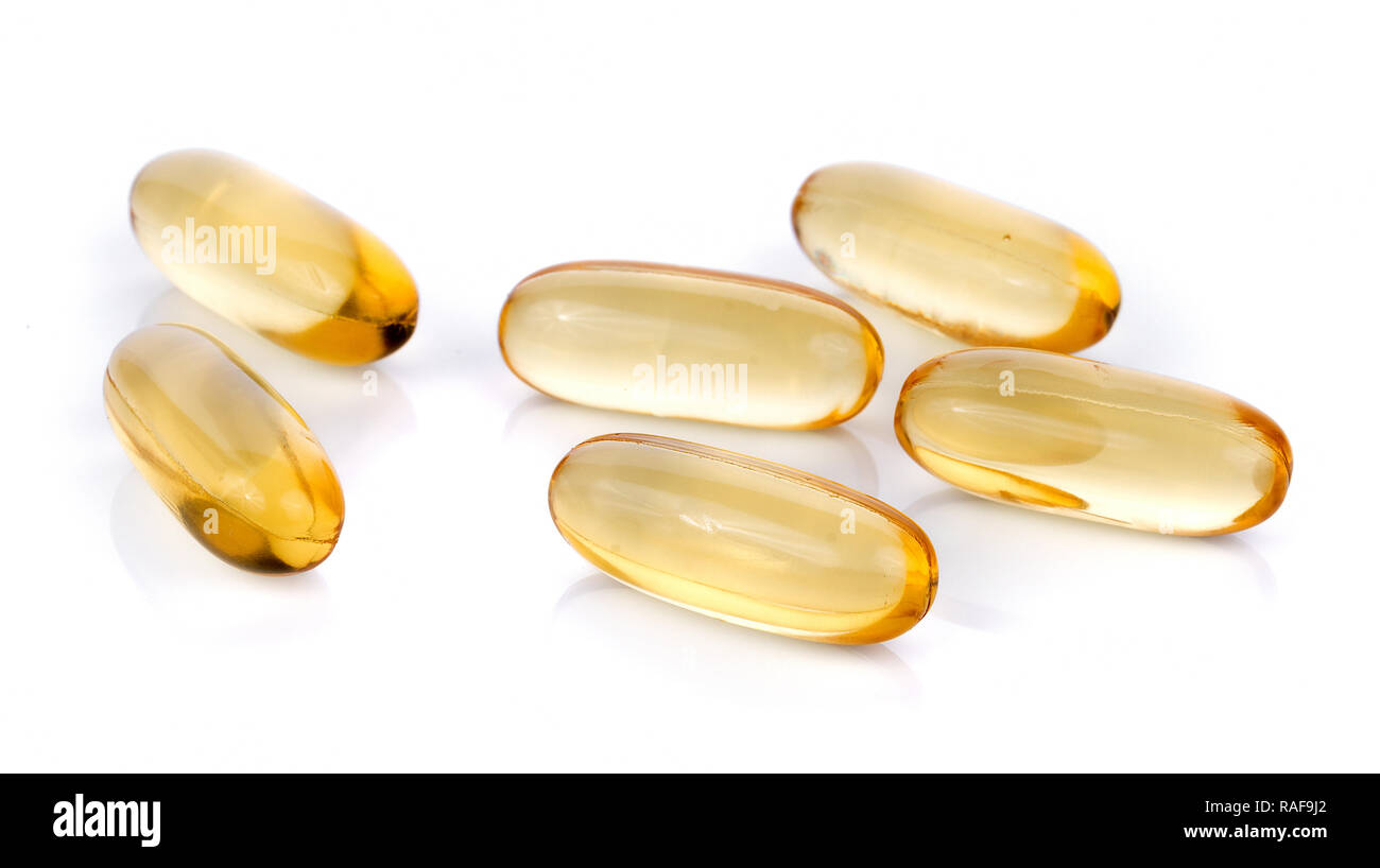 Fish oil pill on white background Stock Photo - Alamy