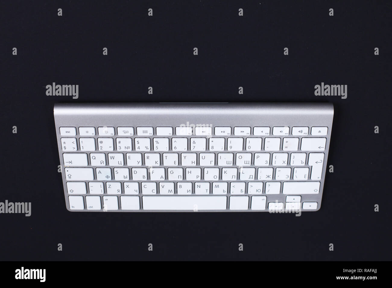Modern aluminum keyboard on table in the office Stock Photo - Alamy