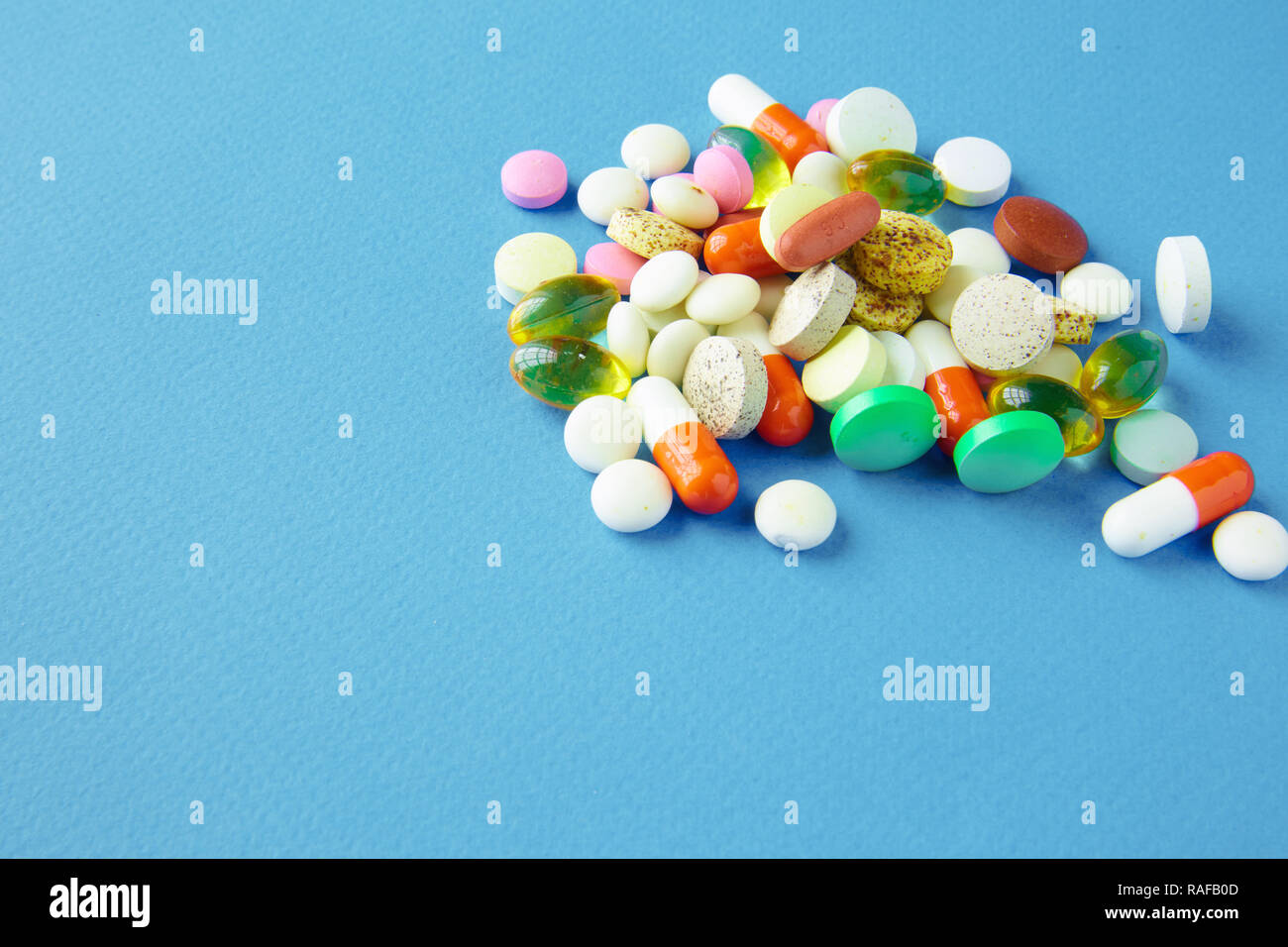 Assortment of pills, tablets and capsules on table Stock Photo - Alamy
